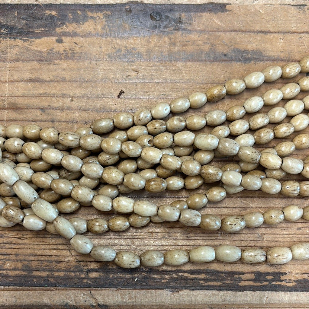 Tan Wood Tubes Strand- about 1/4” – California Hula Center
