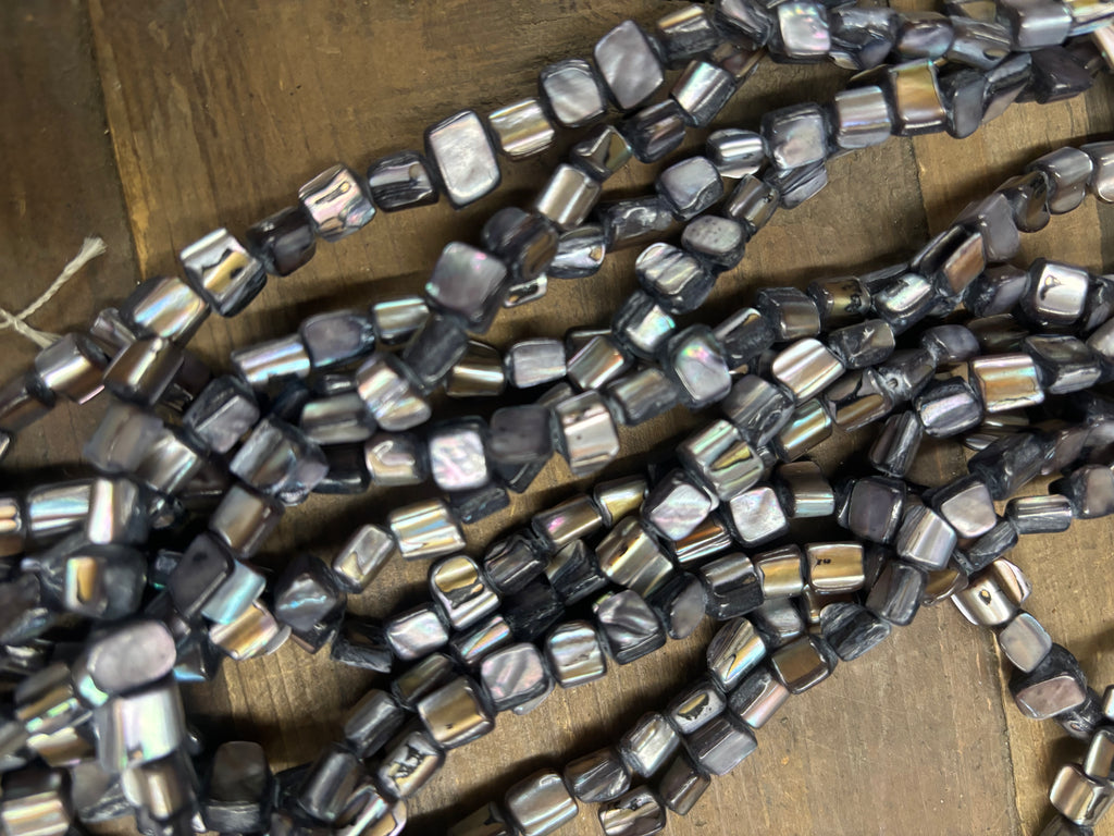 Mother of Pearl Natural Cube Shell Strand – California Hula Center